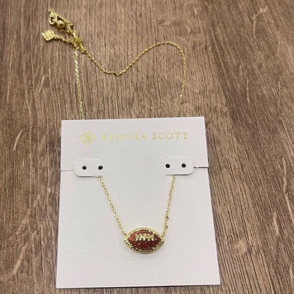 Kendra Scott | Jewelry | Kendra Scott Football Gold Short Pendant ...